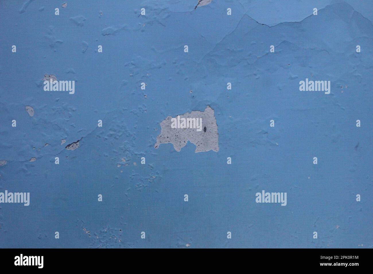 broken blue wall due to lack of maintenance Stock Photo - Alamy