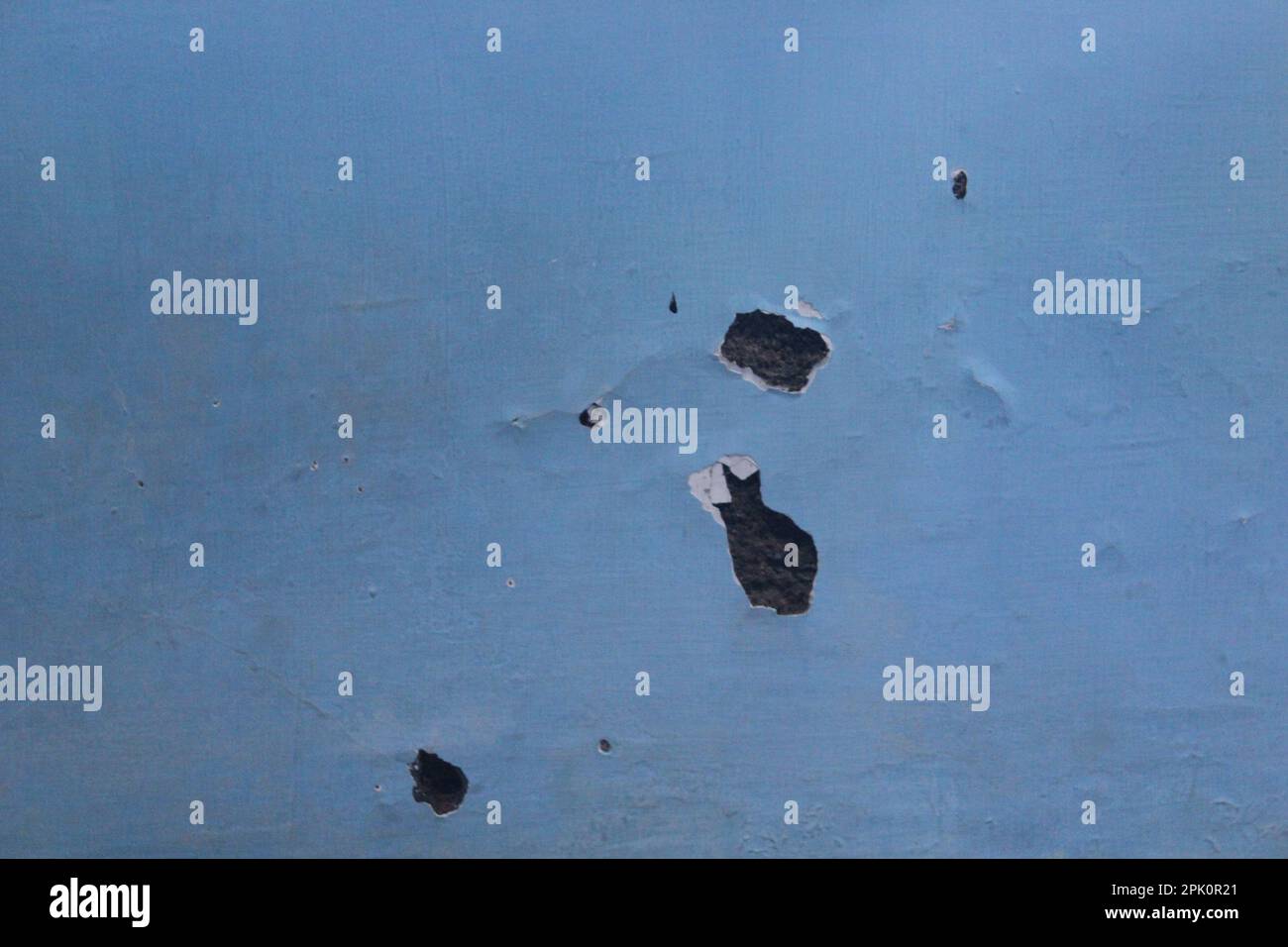 broken blue wall due to lack of maintenance Stock Photo - Alamy
