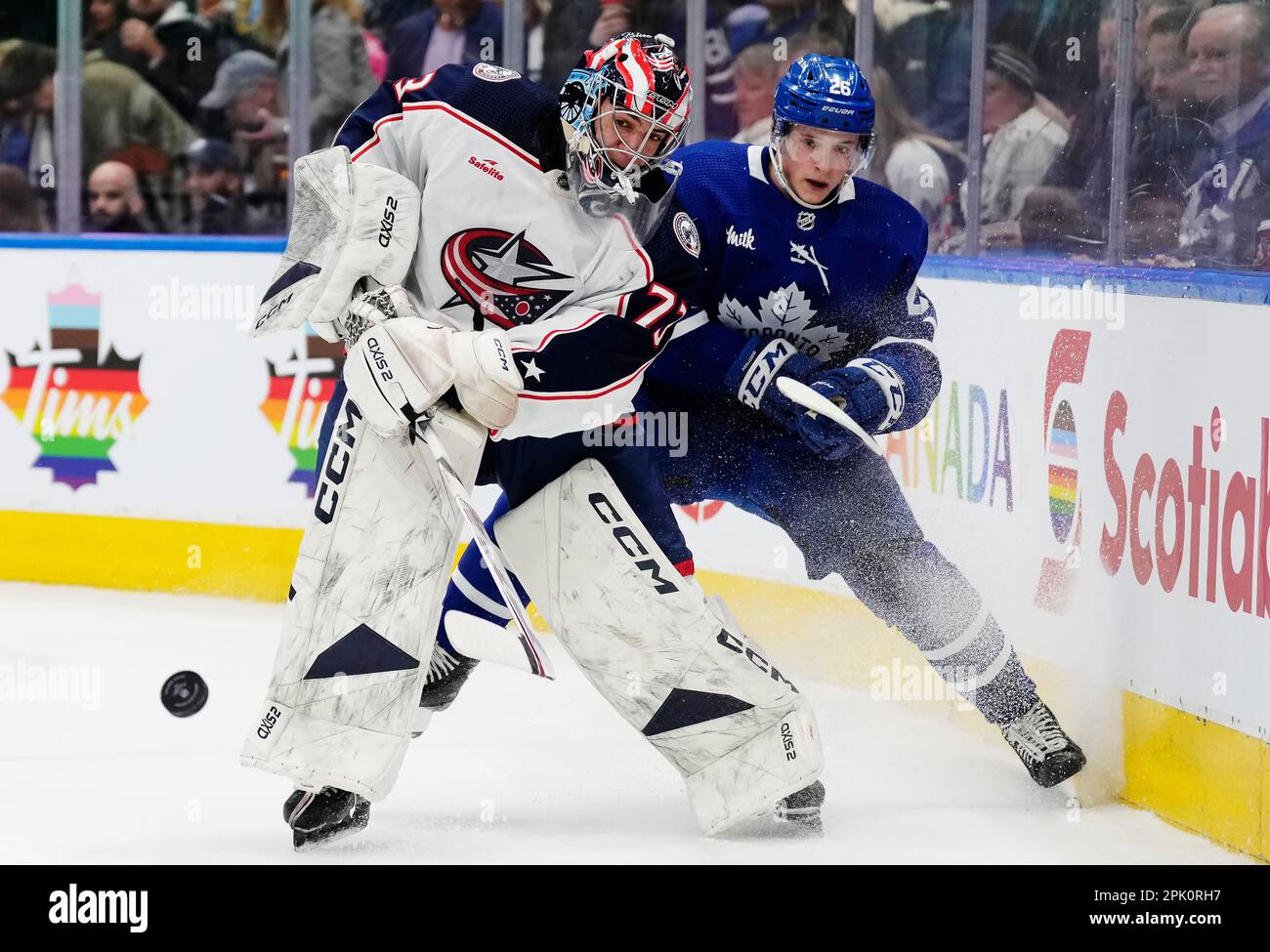 Columbus Blue Jackets' goaltender Jet Greaves plays the puck ahead of ...