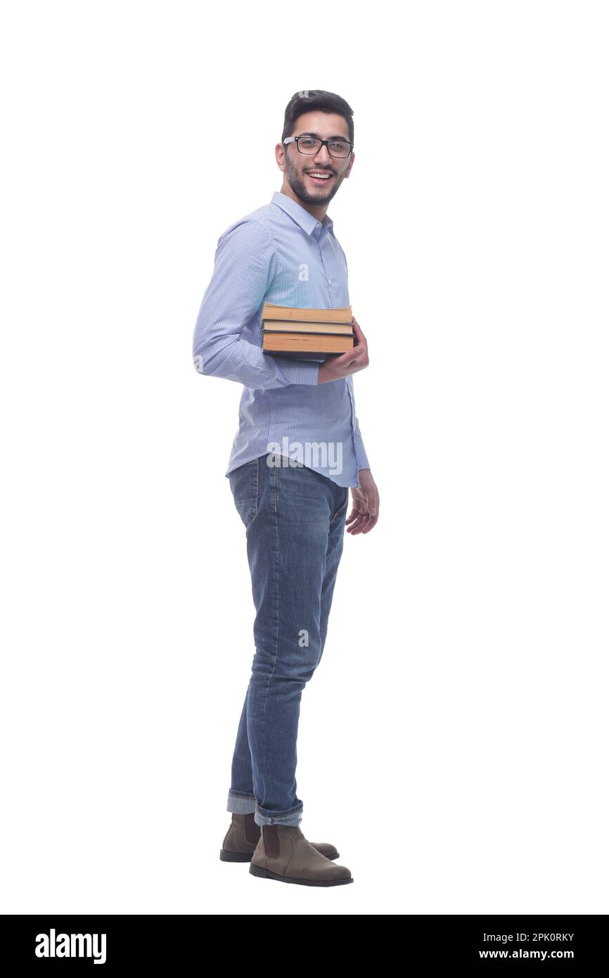 casual young man with a stack of books Stock Photo - Alamy