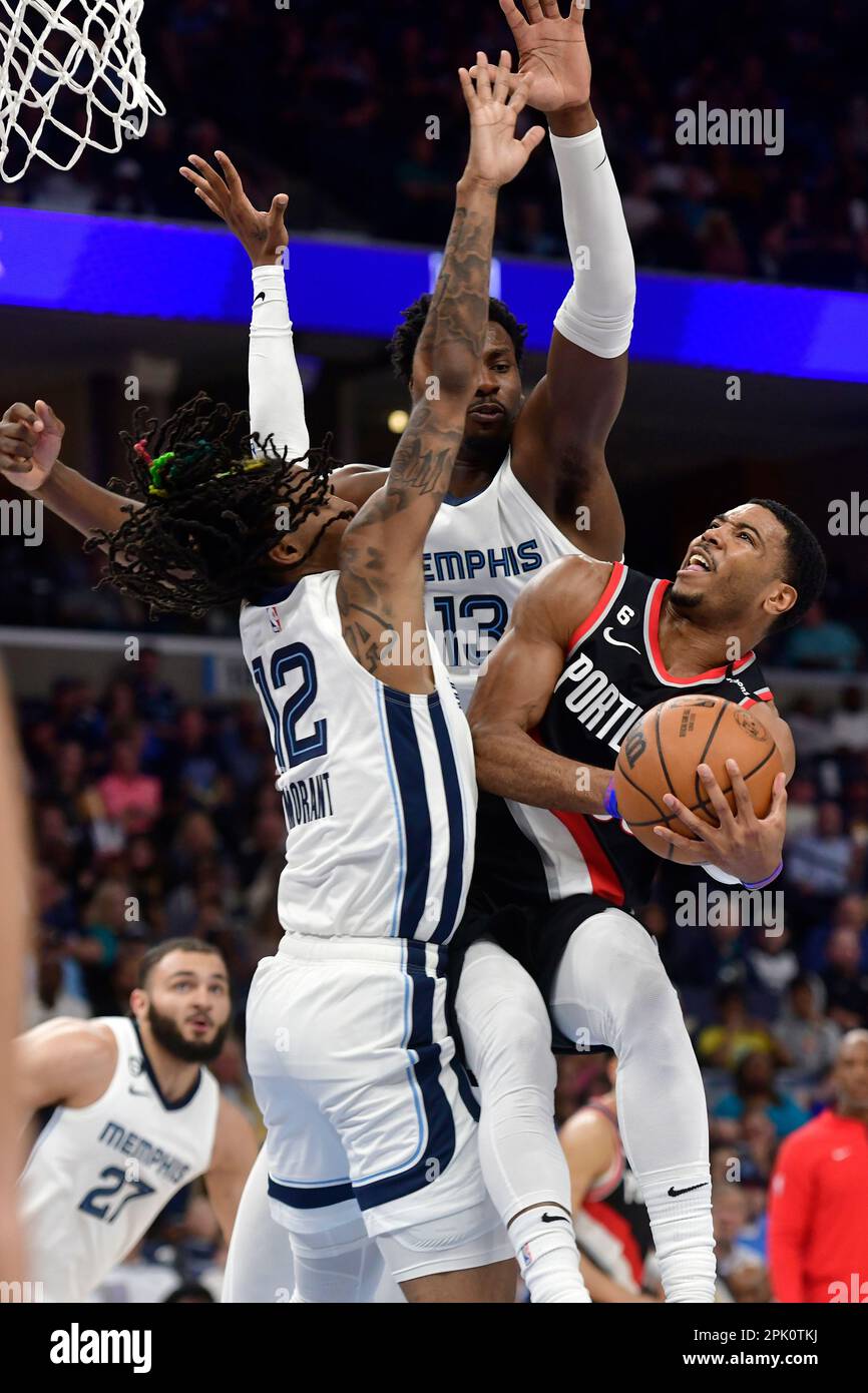 Portland Trail Blazers guard Shaq Harrison, right, shoots against ...