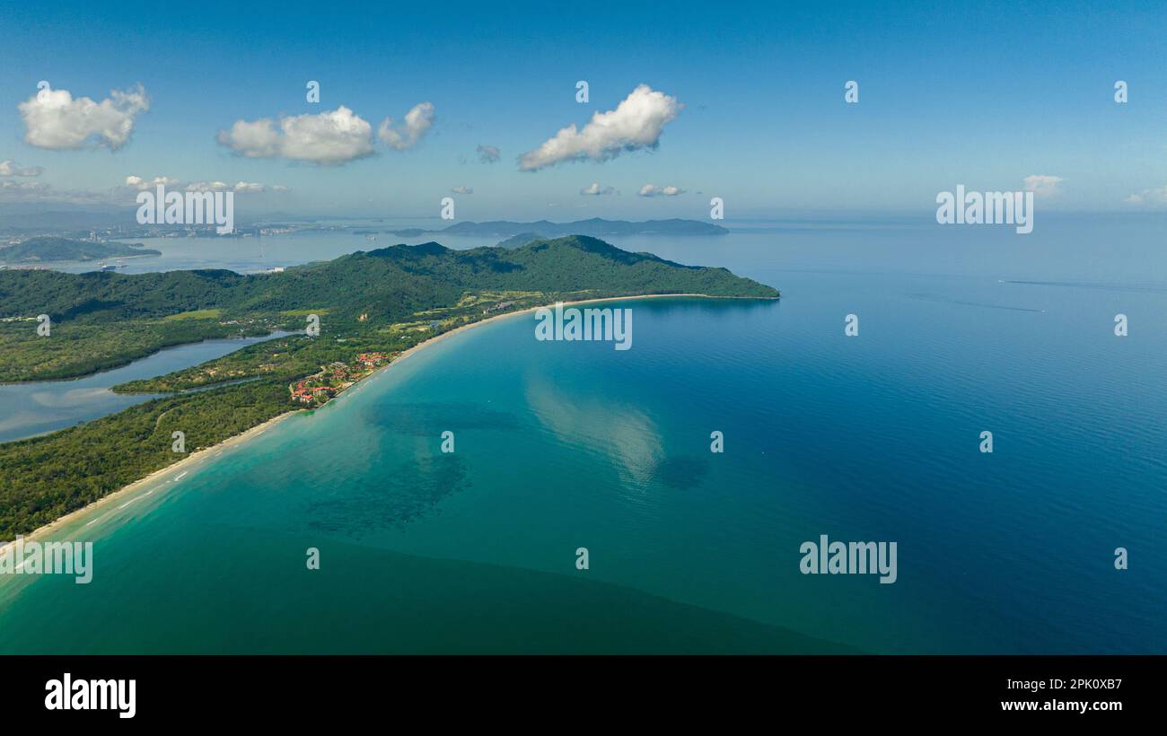 Aerial view of Borneo island coastline with beach and Kota Kinabalu ...