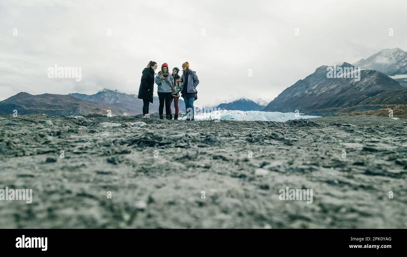 Aerial view of girls on Matanuska Glacier State Recreation Area in ...