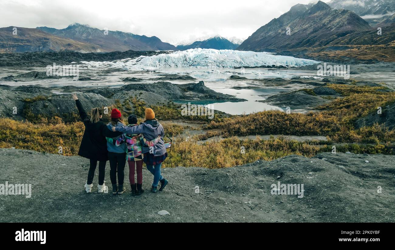 Aerial view of girls on Matanuska Glacier State Recreation Area in ...