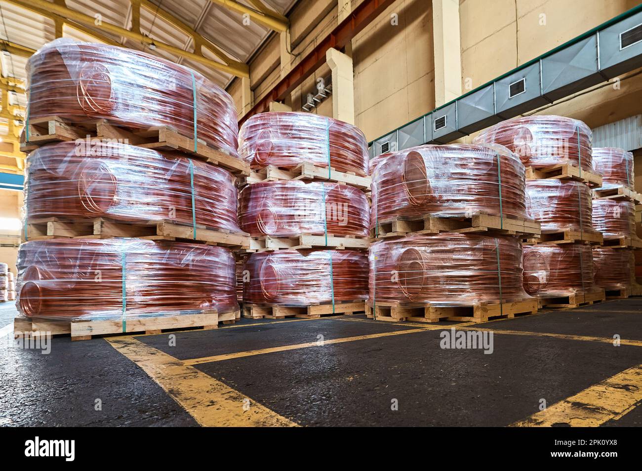 Rows of copper wire rod coils in production plant warehouse Stock Photo ...