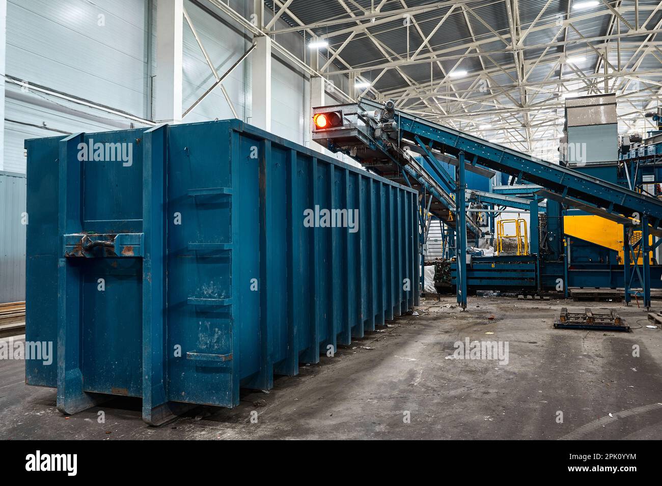 Large container and belt conveyors transporting garbage Stock Photo - Alamy