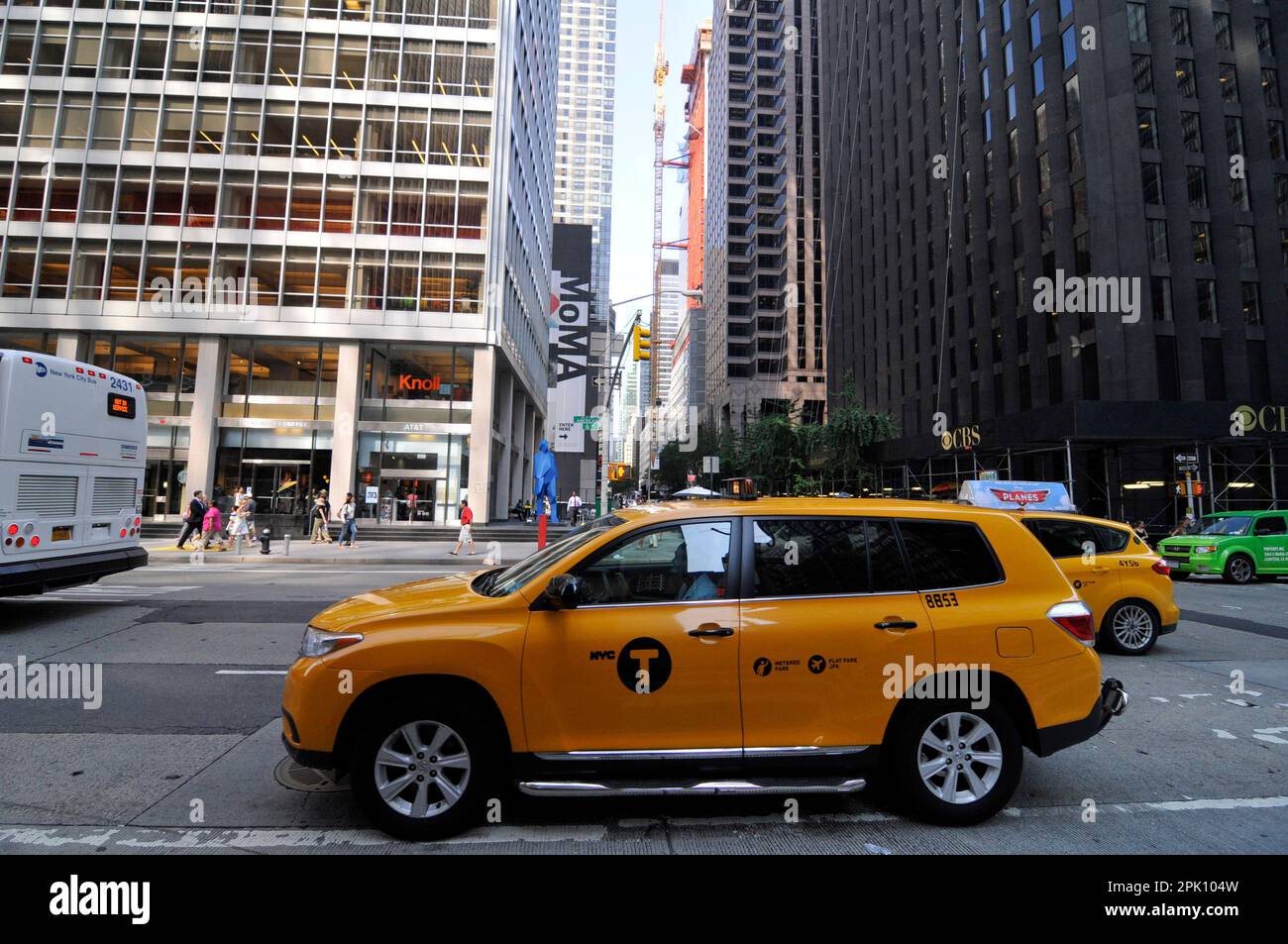 Yellow cabs on the 6th Ave. in Manhattan, New York City, USA Stock ...