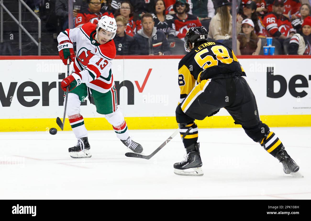 New Jersey Devils center Nico Hischier (13) shoots the puck against ...
