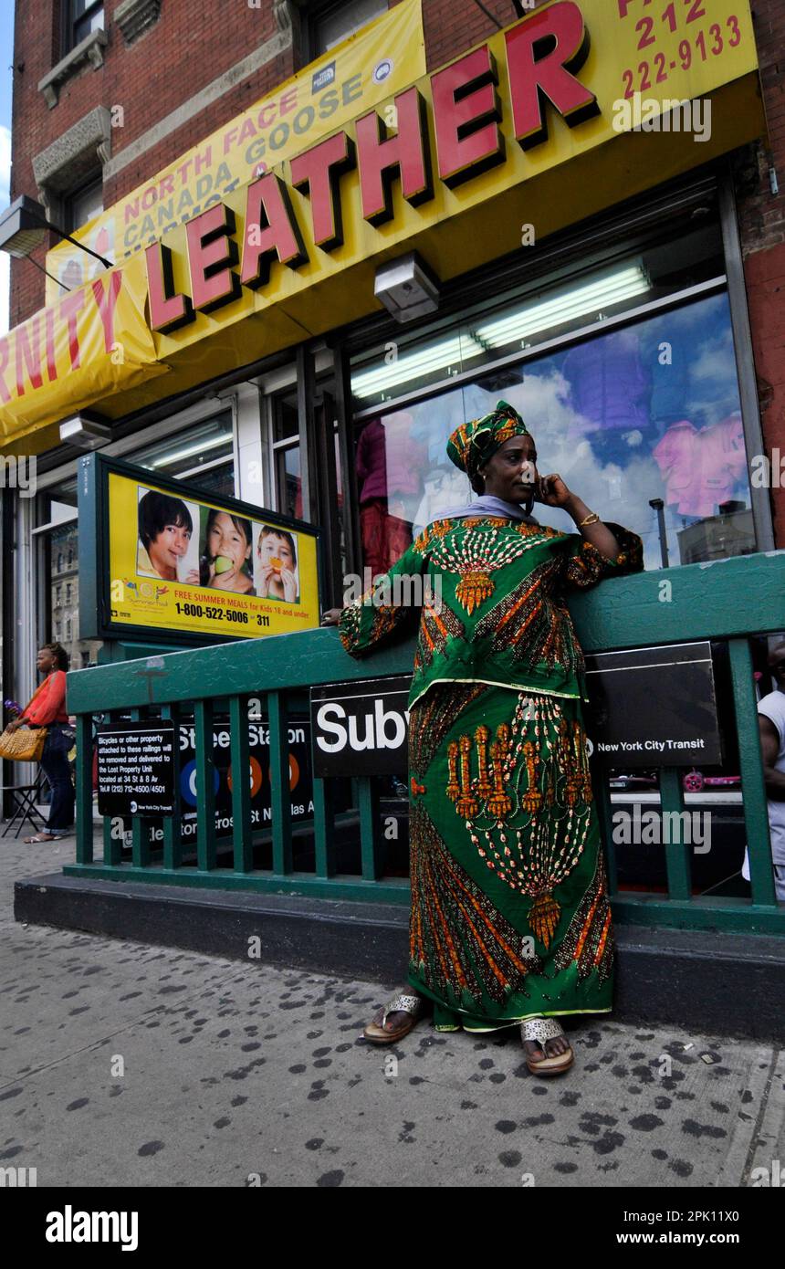 An African woman in Harlem, New York City, USA Stock Photo - Alamy