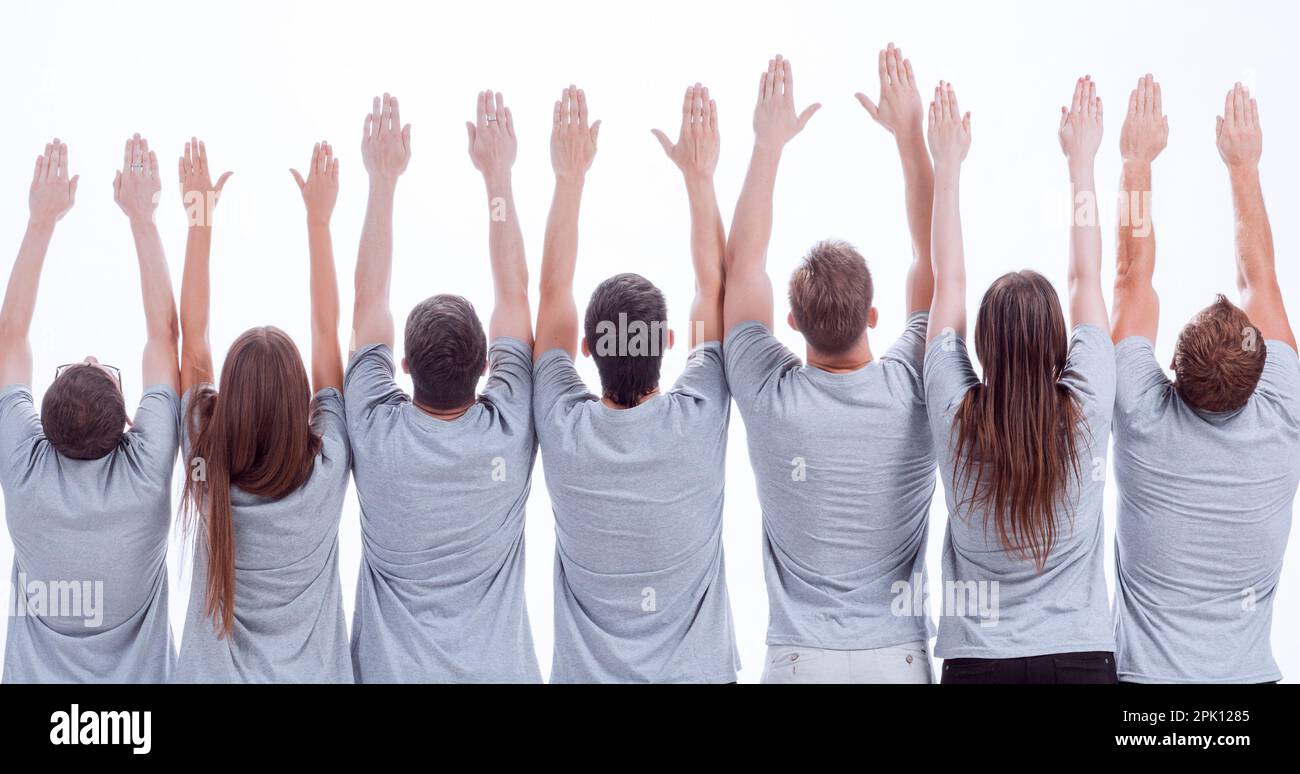 rear view. a group of young like-minded people pointing upwards Stock ...