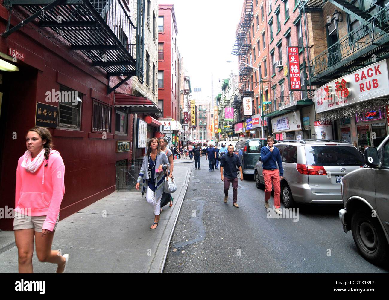 Tourist walking on Pell street in Chinatown in Manhattan, New York City ...