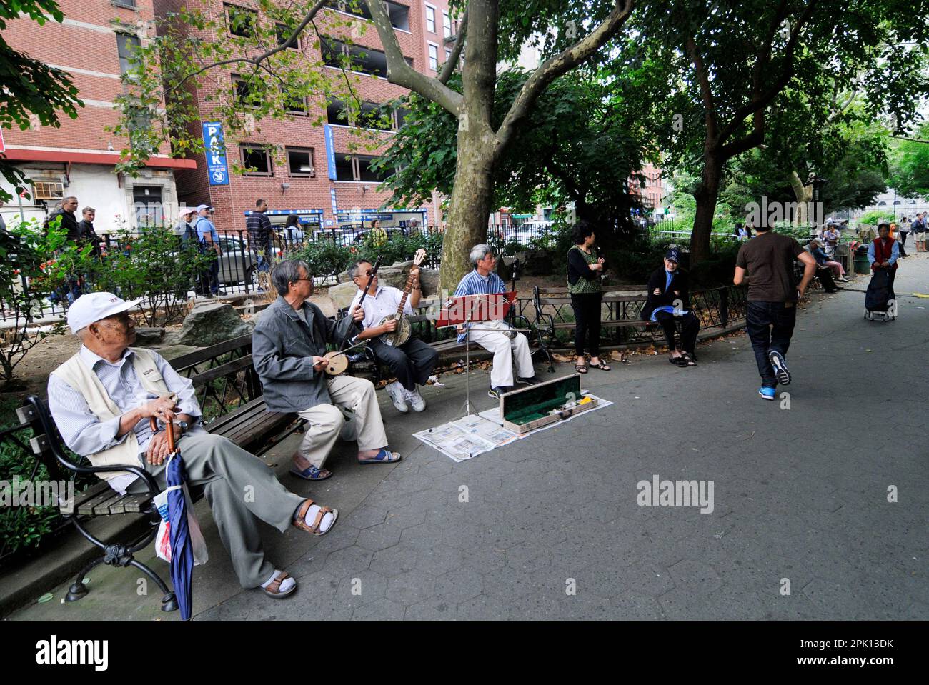 Elderly Chinese men playing their traditional instruments at Dr. Sun ...