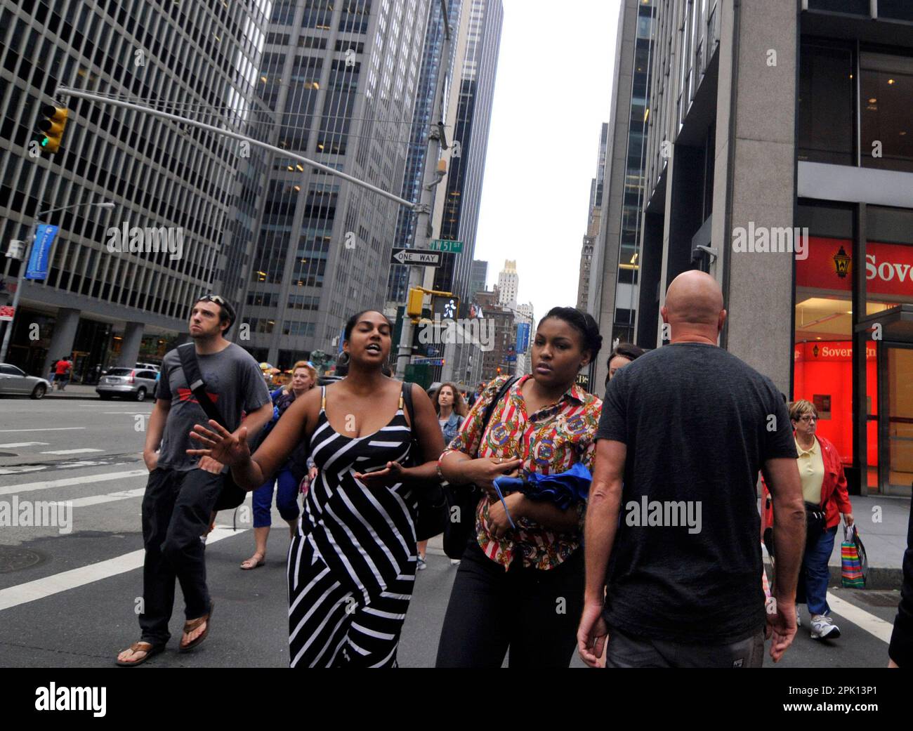 Walking along 6th Ave. near W 51st street in Manhattan, New York City, USA Stock Photo - Alamy