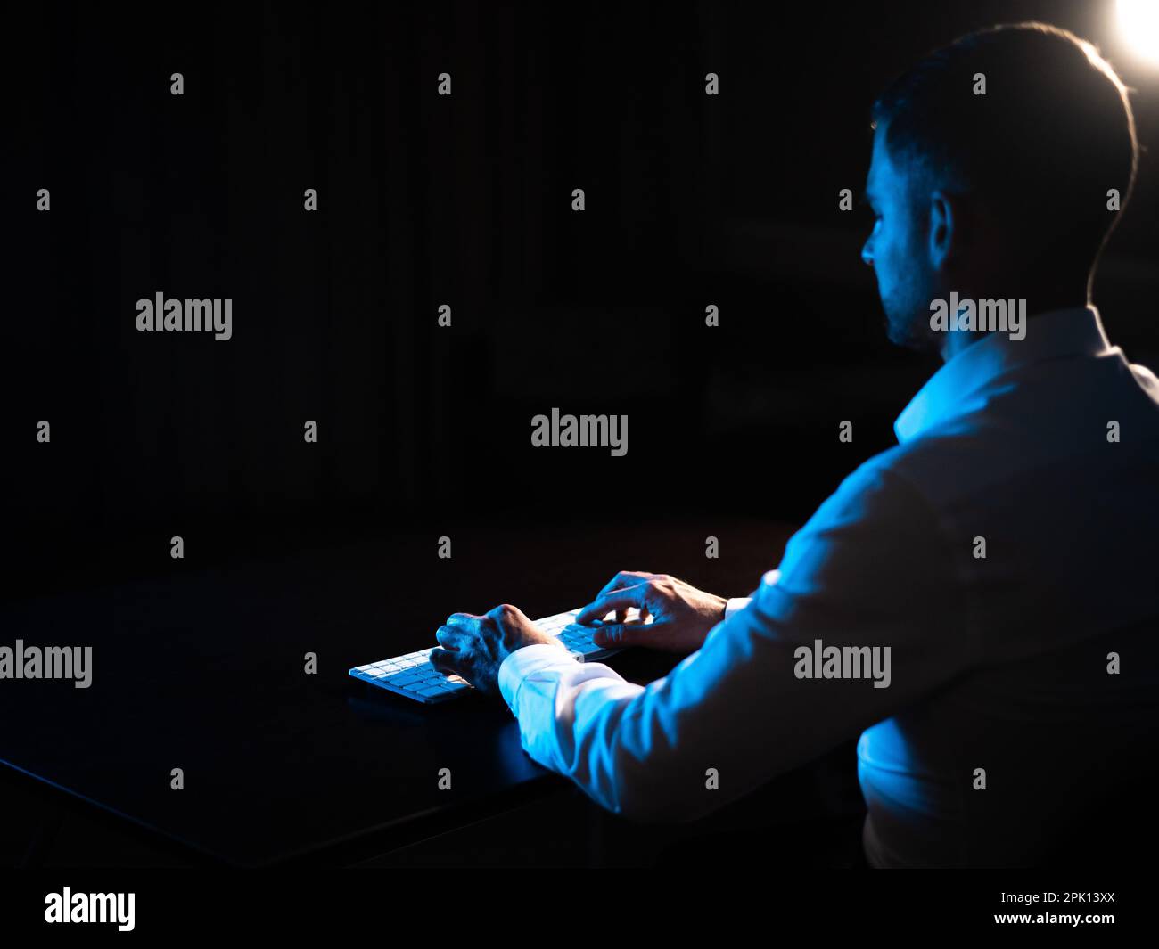 Using computer rear view night hi-res stock photography and images - Alamy