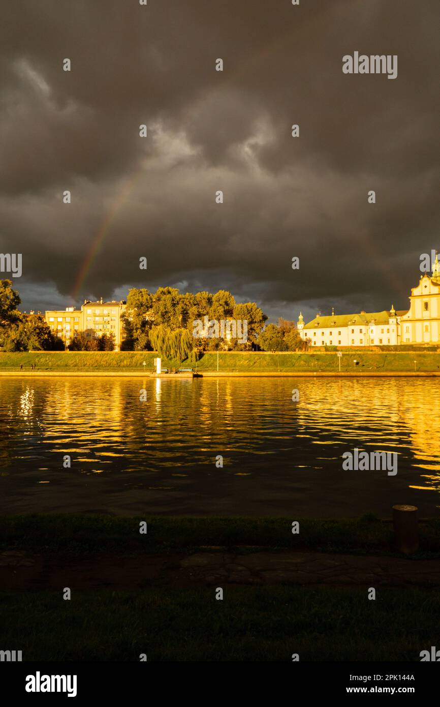 Heavy rain and rainbow above the Vistula river in Krakow Poland ...