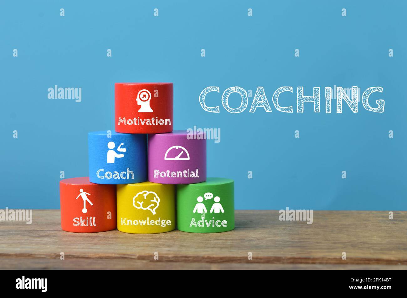 Colorful wooden blocks with coaching symbols Stock Photo - Alamy