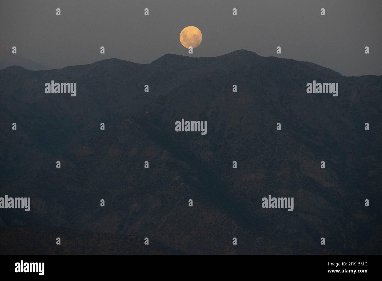 Santiago, Metropolitana, Chile. 4th Apr, 2023. The nearly full moon, at ...