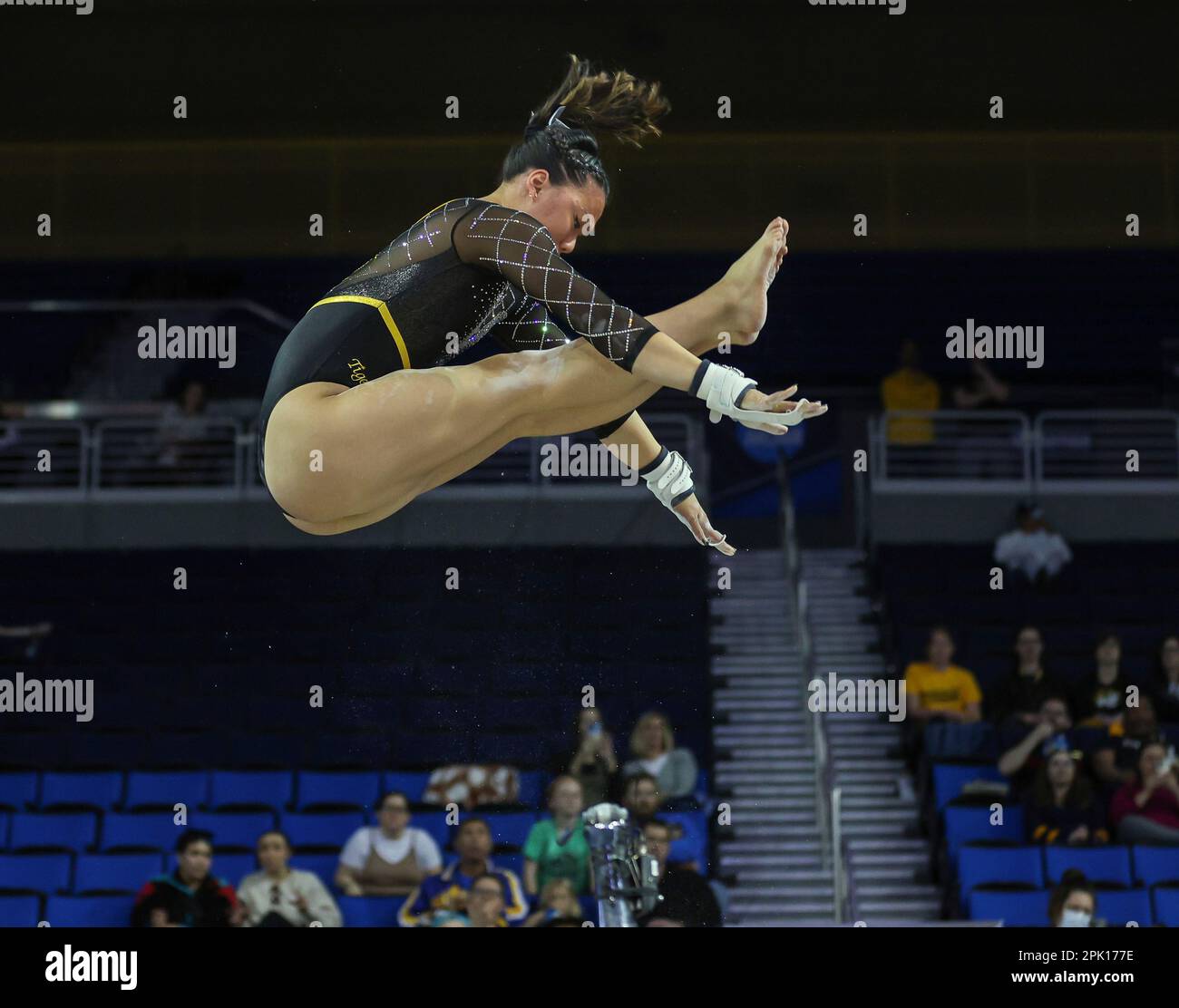 April 1, 2023: Missouri's Helen Hu does a release move on the bars ...