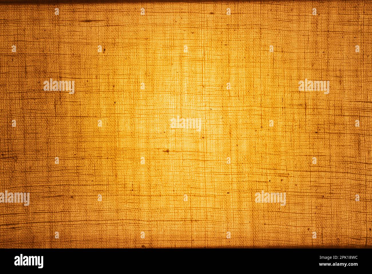 Natural cotton lampshades give warm light and light shining from behind ...