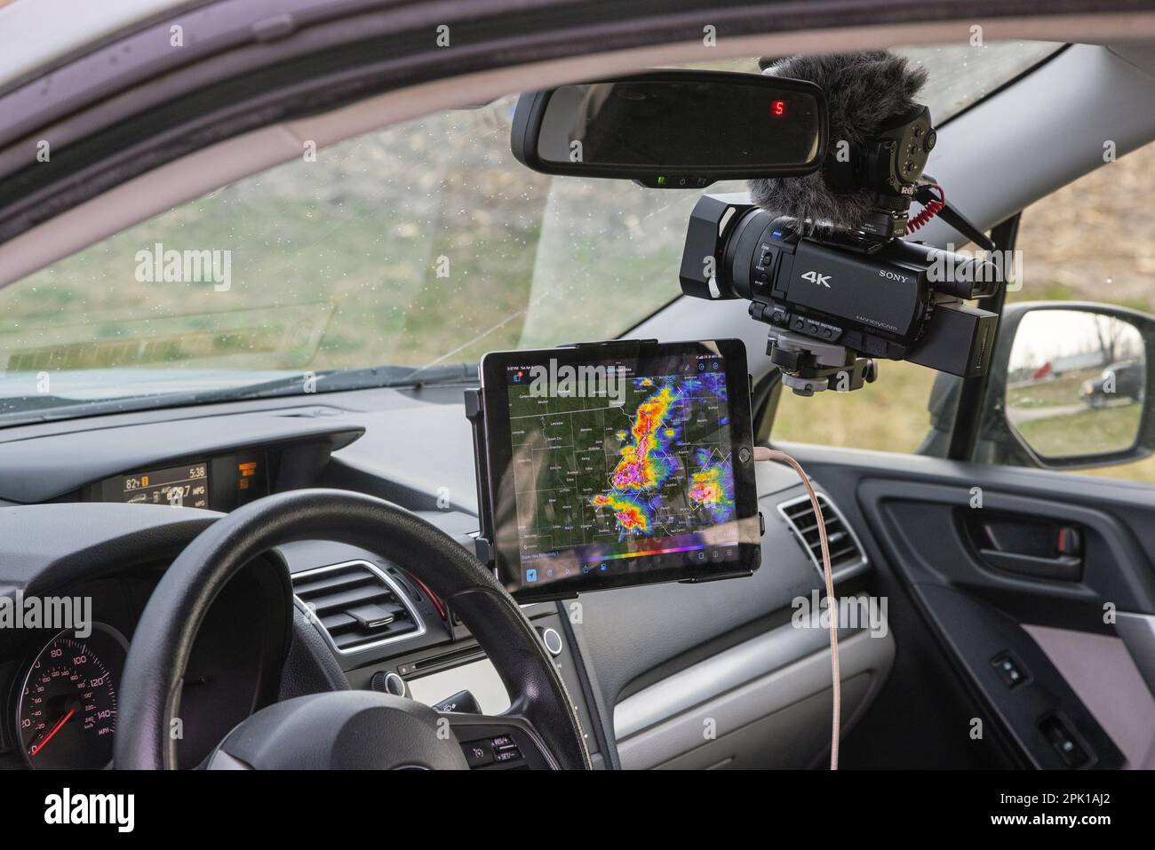 Tornado chaser in car hi-res stock photography and images - Alamy