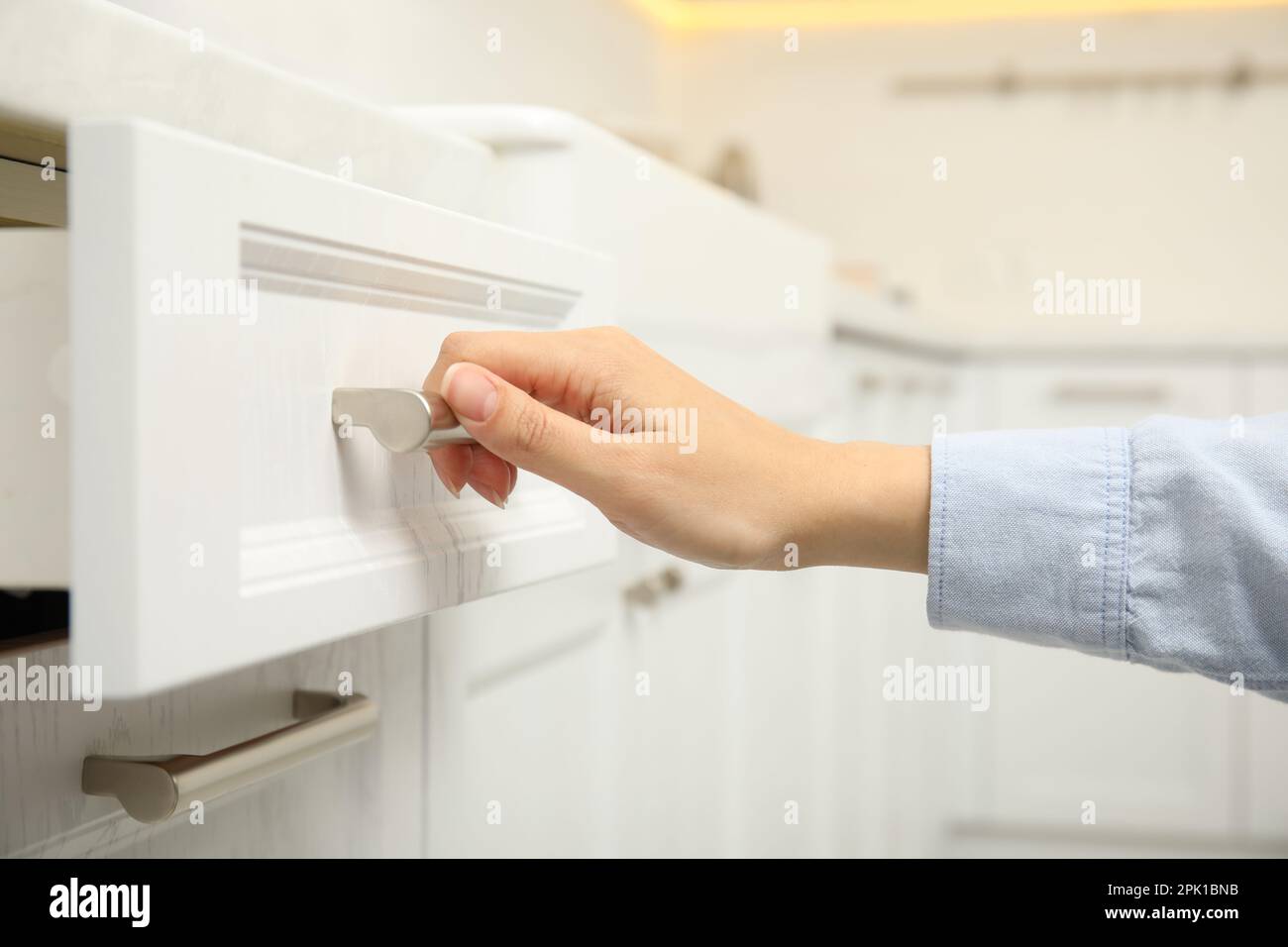 Hand opening drawer in hi-res stock photography and images - Alamy