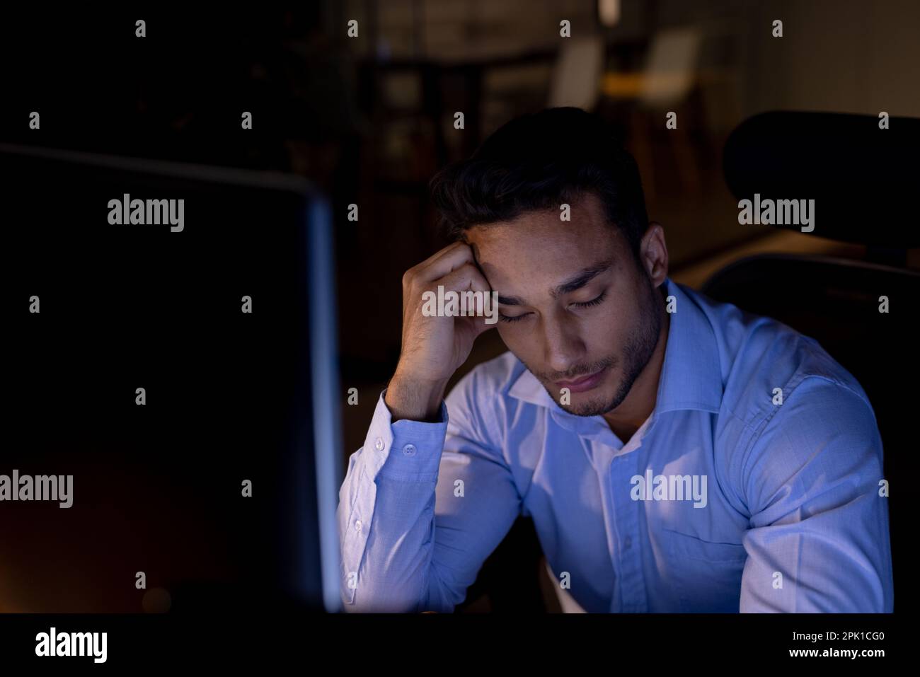 Tired biracial businessman desk using hi-res stock photography and ...