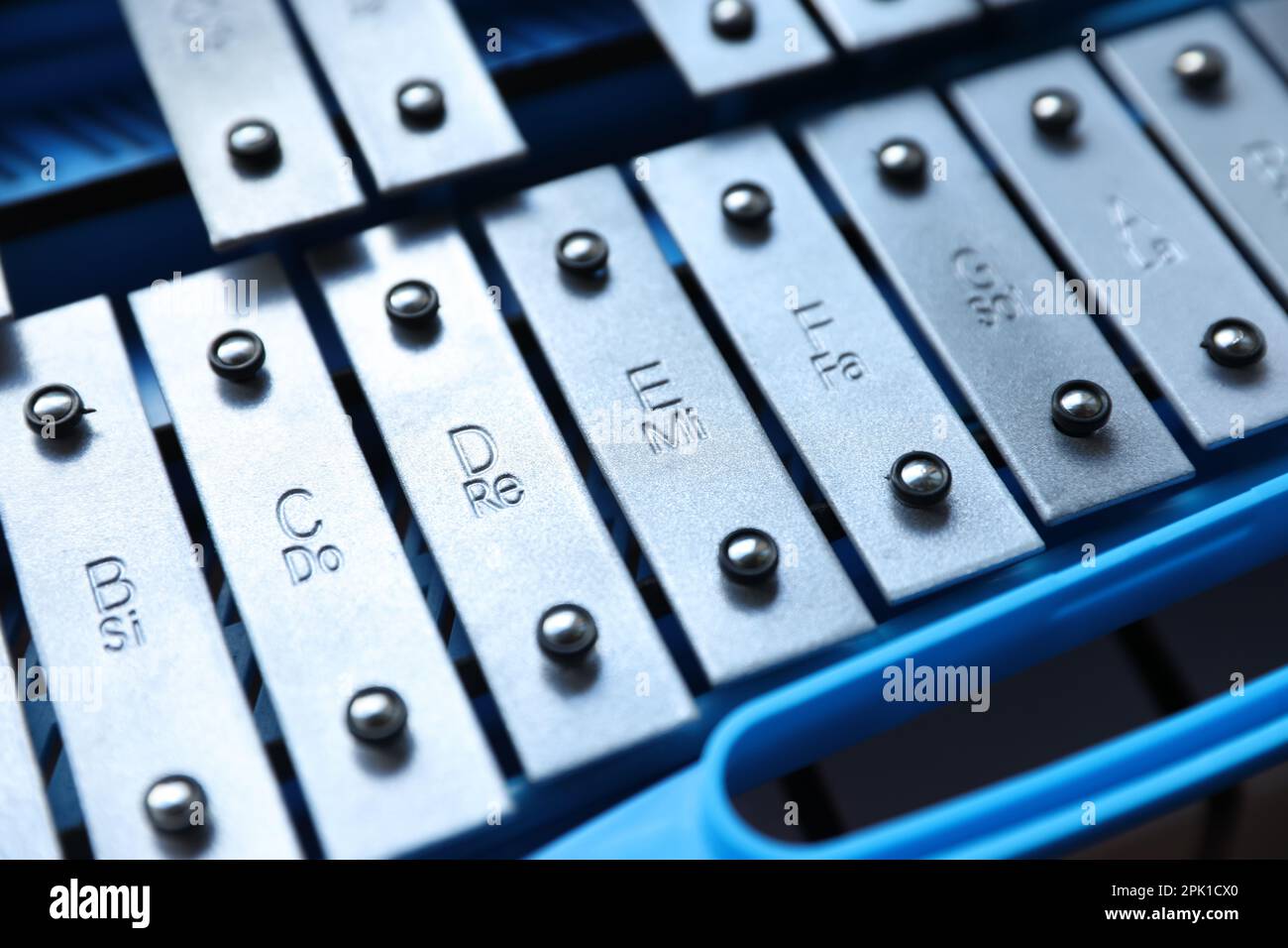Closeup view of xylophone in light blue case Stock Photo - Alamy