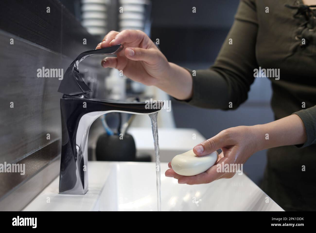 Woman washing hands bar soap hi-res stock photography and images - Alamy