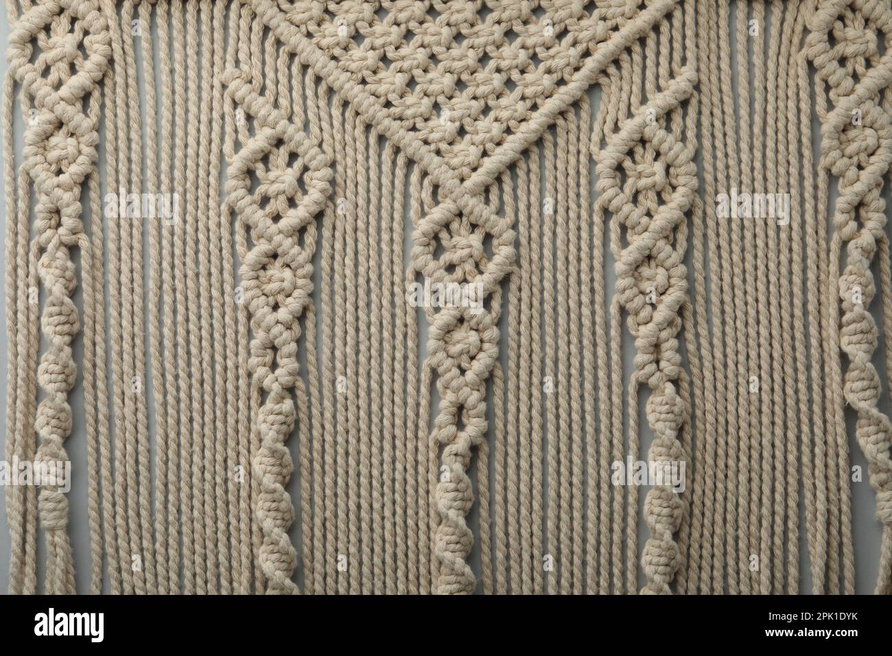 Texture of beautiful macrame as background, top view. Decorative ...