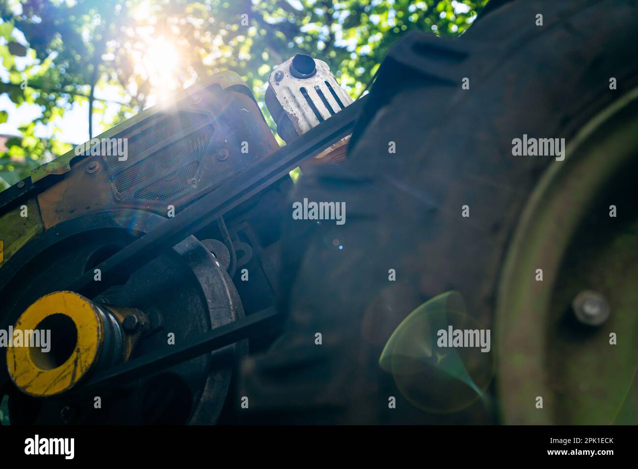 Diesel engine of a walk-behind tractor with a belt drive close-up ...
