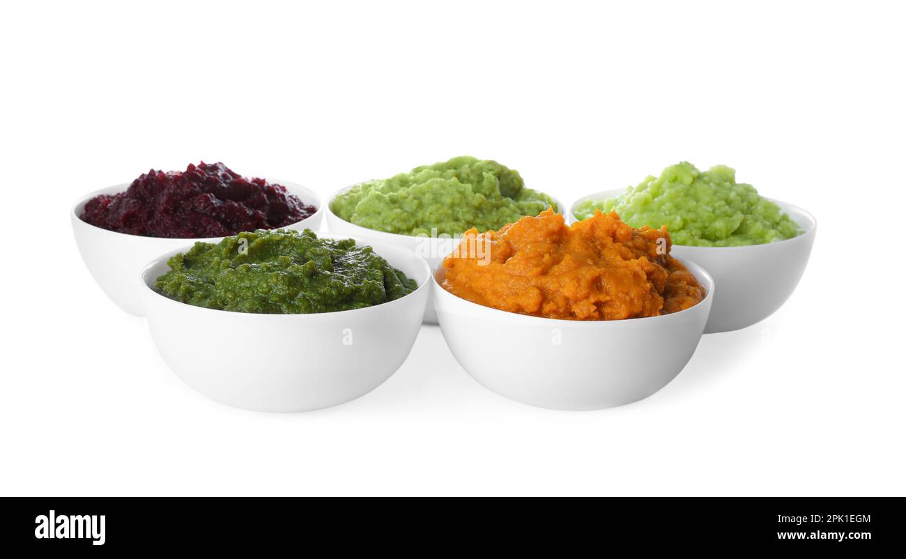 Different delicious in bowls puree on white background. Healthy food ...