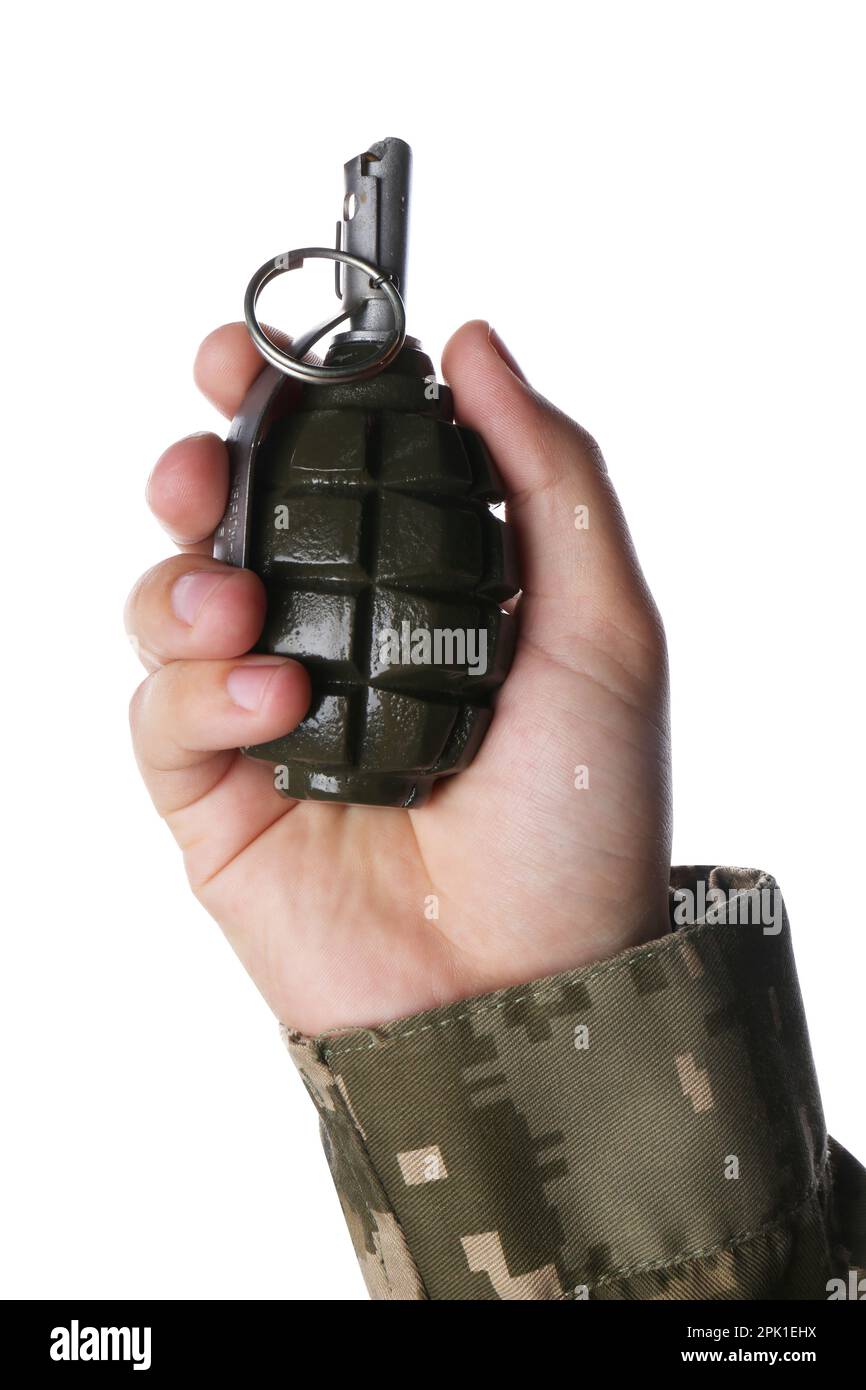 Soldier holding hand grenade on white background, closeup Stock Photo ...