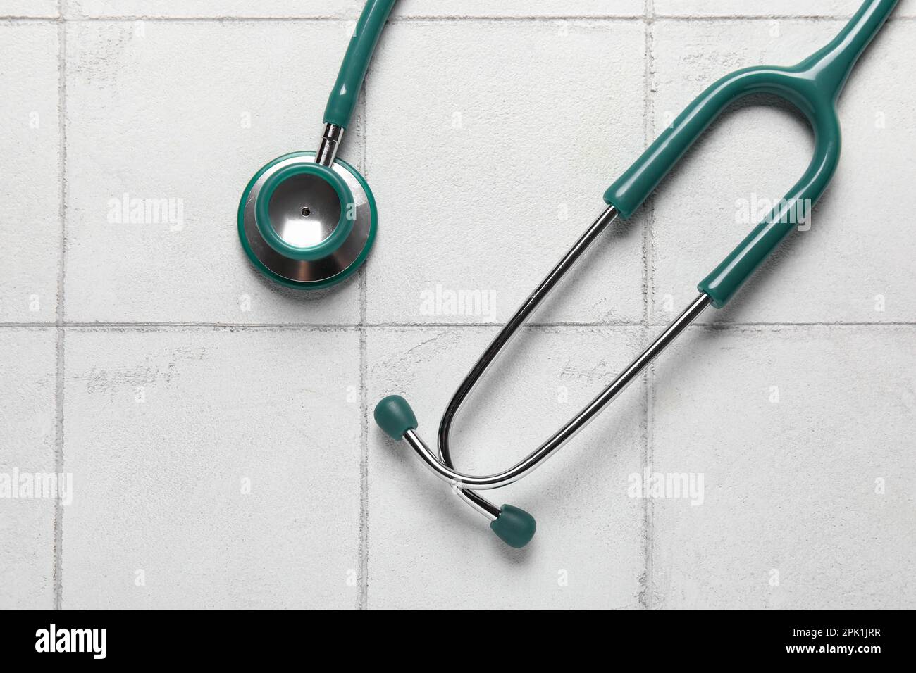 Modern stethoscope on light background Stock Photo - Alamy