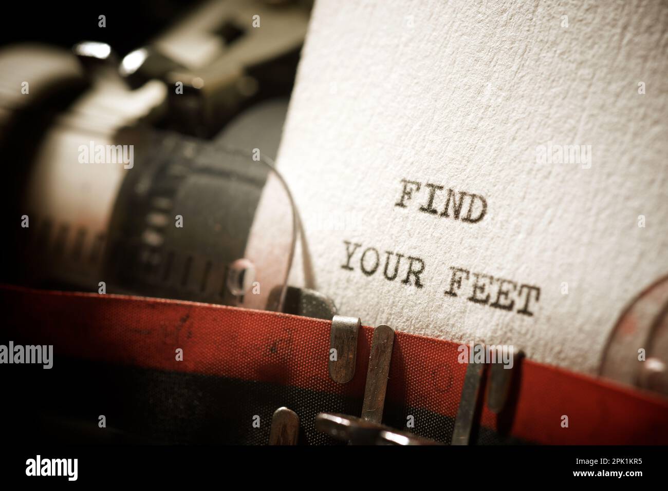 Find your feet text written with a typewriter Stock Photo - Alamy