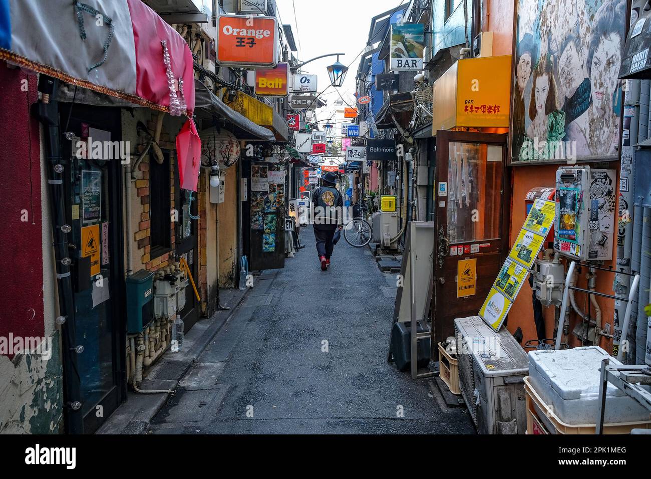 Tokyo, Japan - March 7, 2023: A street in the Golden Gai neighborhood ...