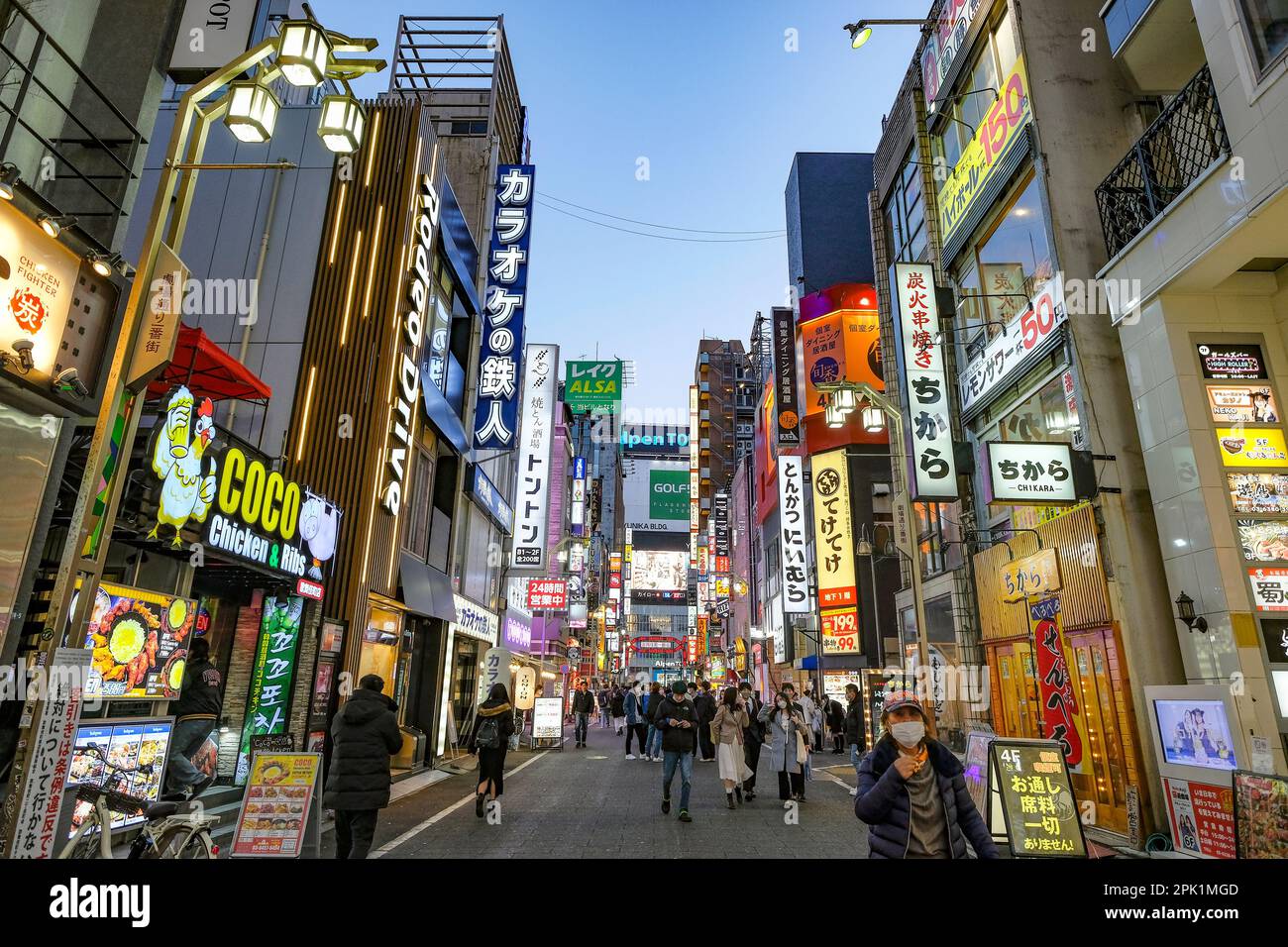 Tokyo, Japan - March 7, 2023: People on a street in the Kabukicho ...