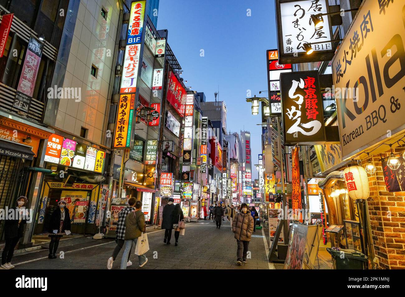 Tokyo, Japan - March 7, 2023: People on a street in the Kabukicho ...