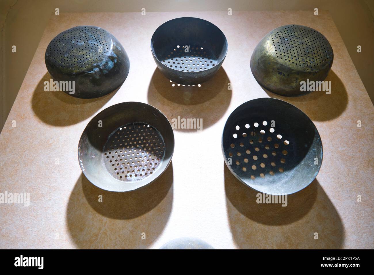 Old metal bowls, once used for pearl processing, cleaning, sorting. At ...
