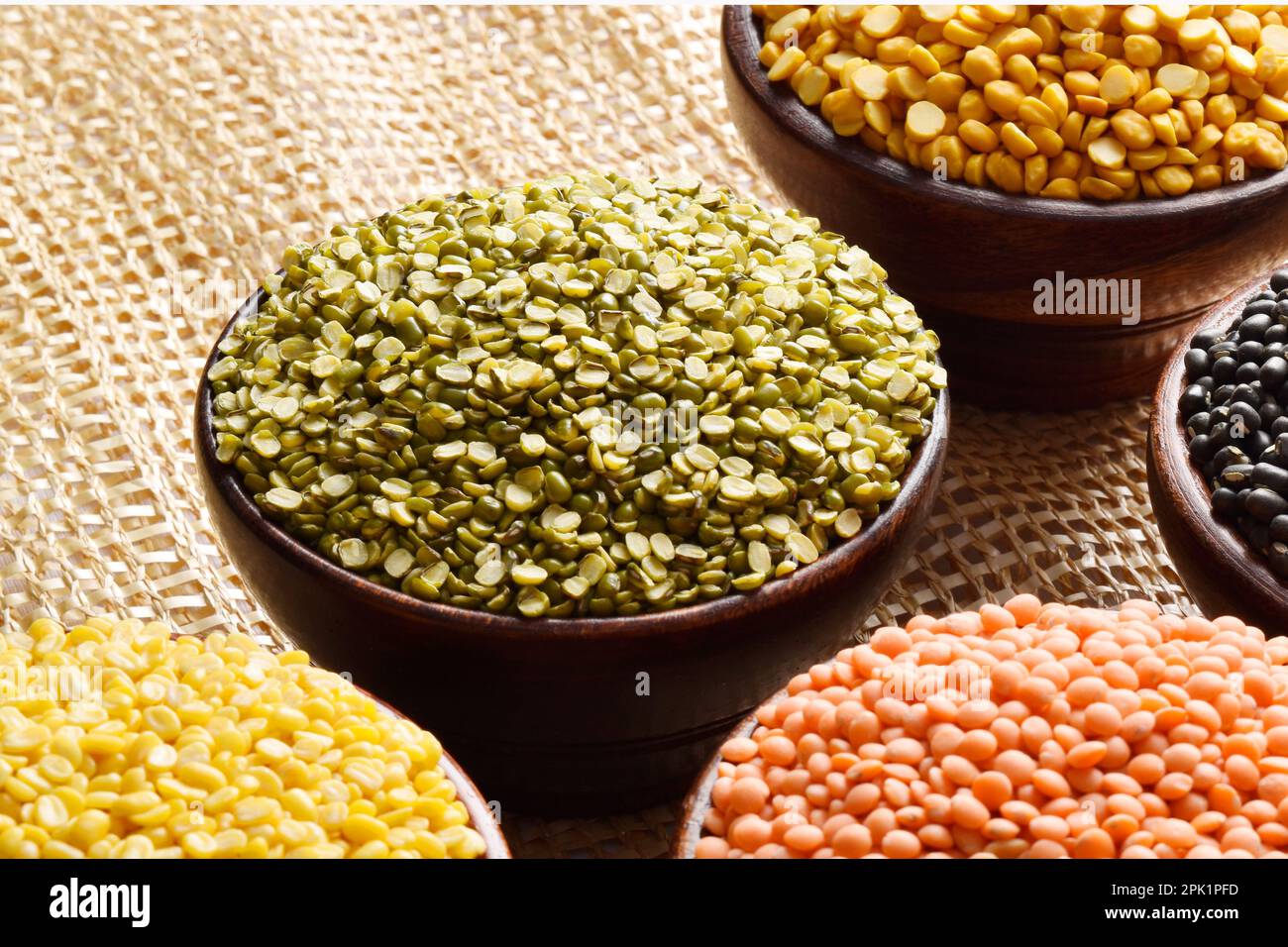 Raw split moong gram in bowl Stock Photo - Alamy