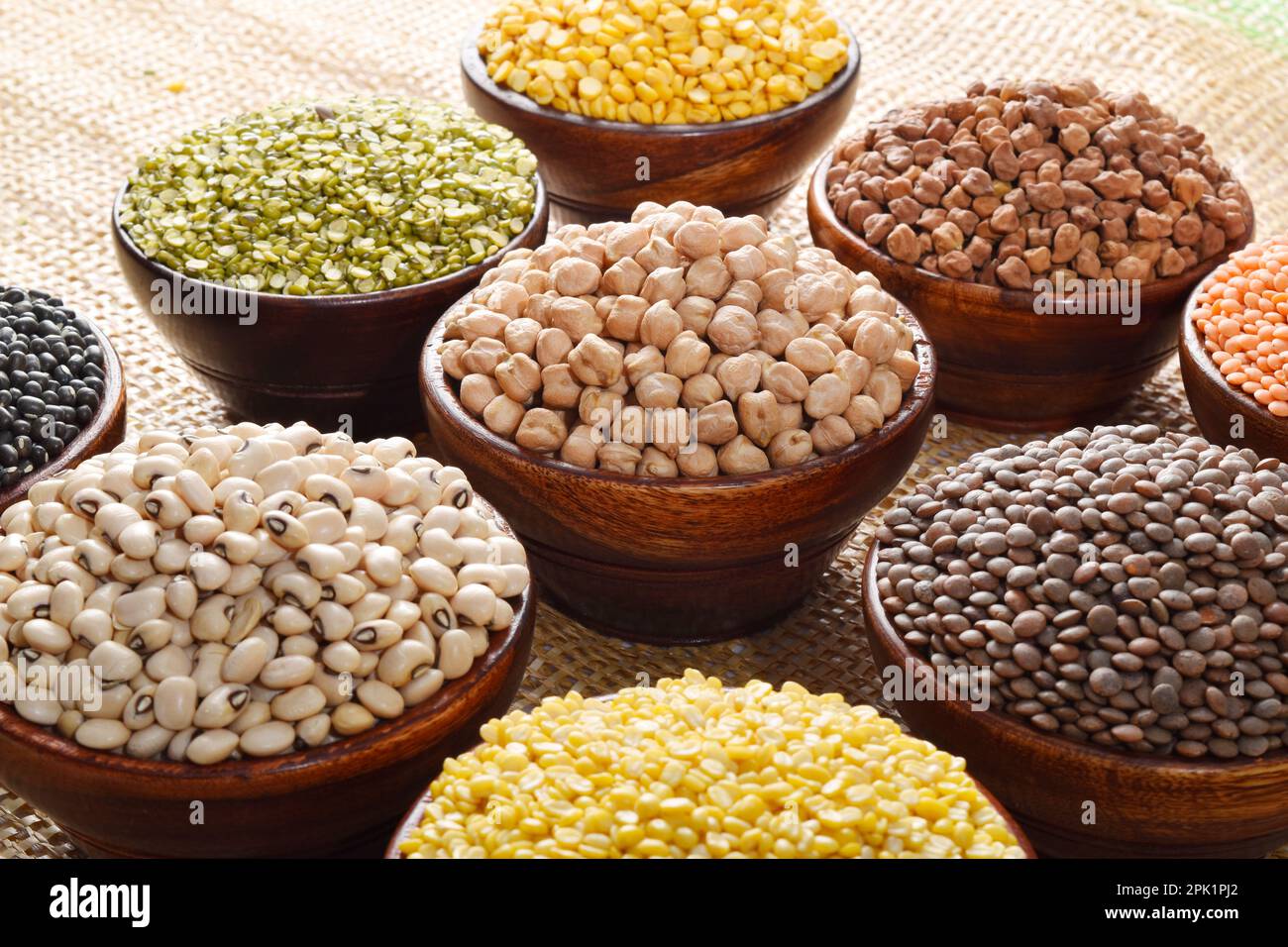 Raw lentils and legume family in bowl Stock Photo - Alamy