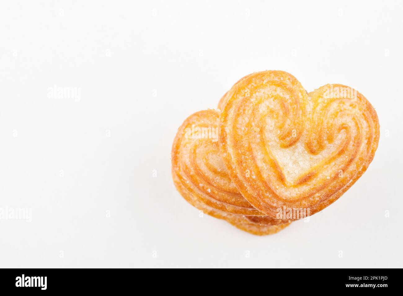 Heart shape biscuit on white background Stock Photo - Alamy
