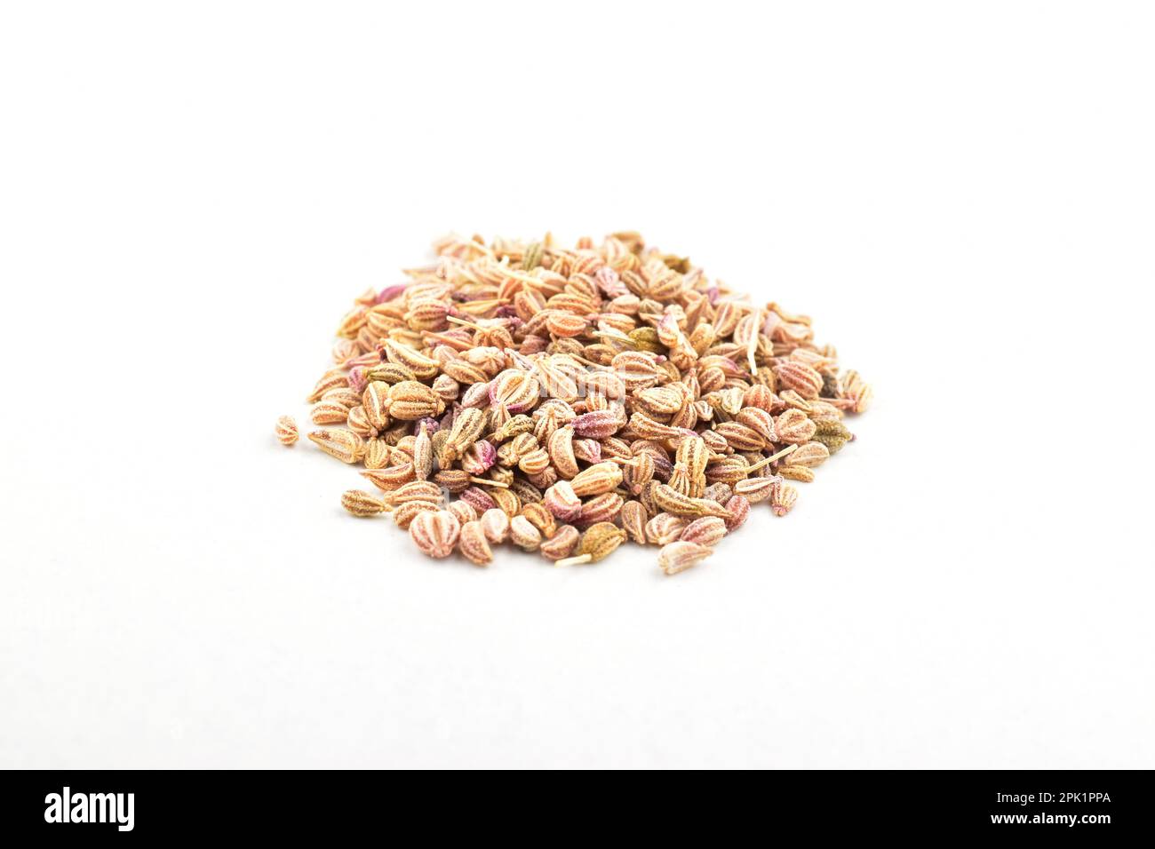 Closuep of carom seeds on white background Stock Photo - Alamy