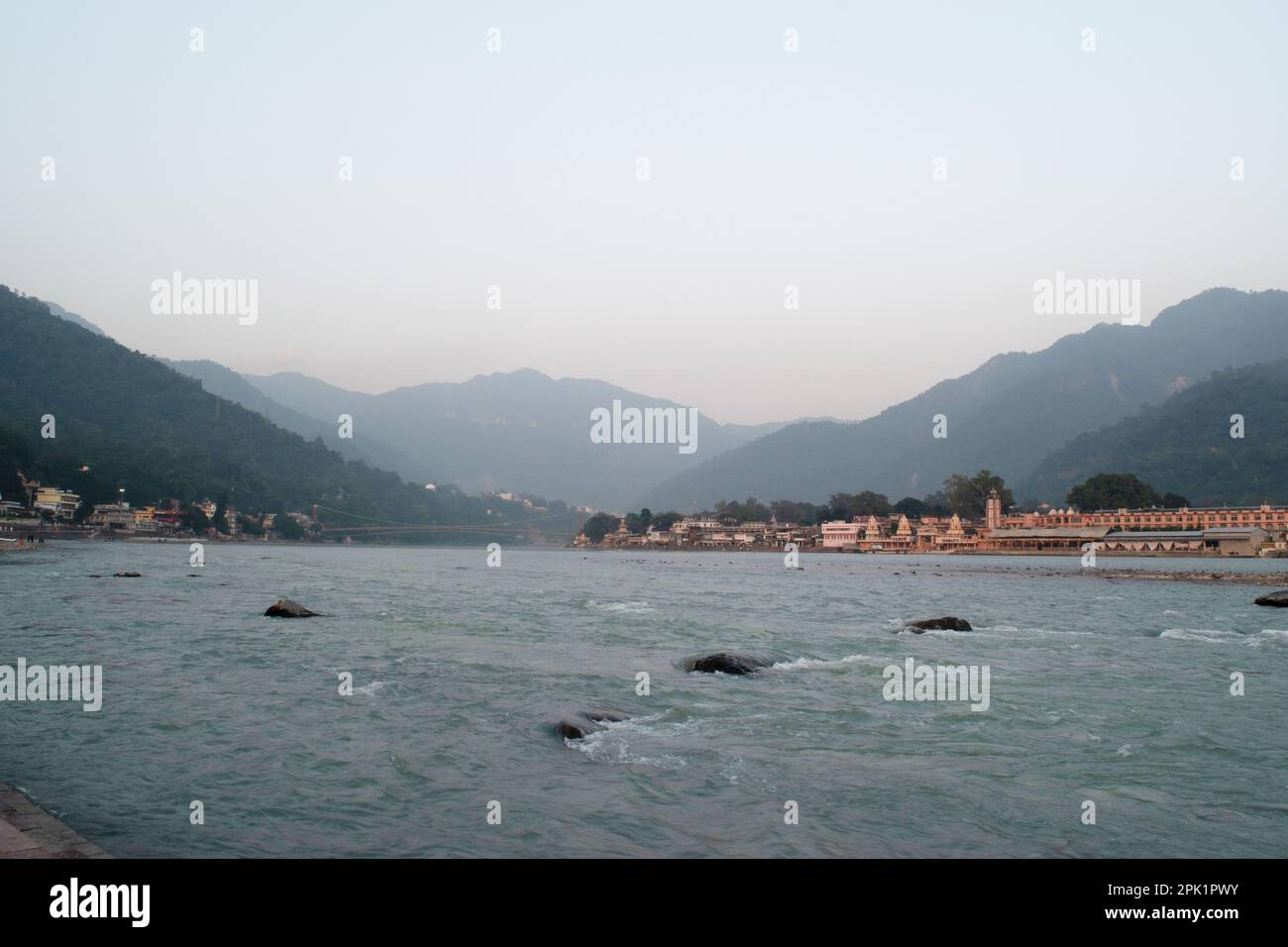Winter view of ganga and mountain at rishikesh Stock Photo - Alamy