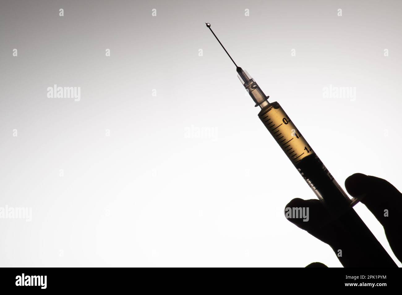 Closeup of drug injection in hand with text space Stock Photo - Alamy