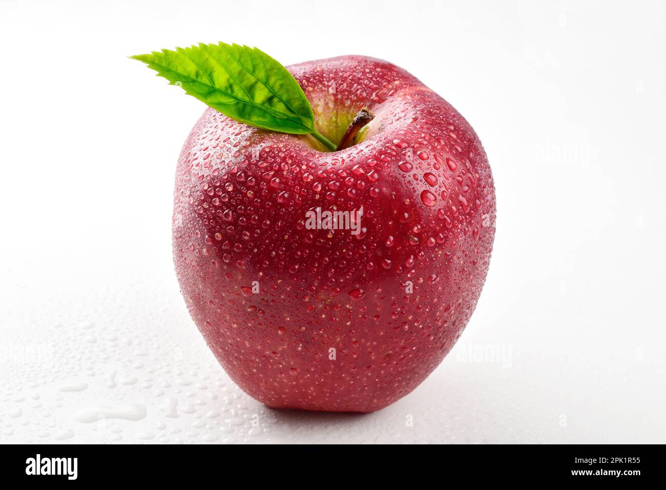 Apple with water drops isolated on white background Stock Photo - Alamy