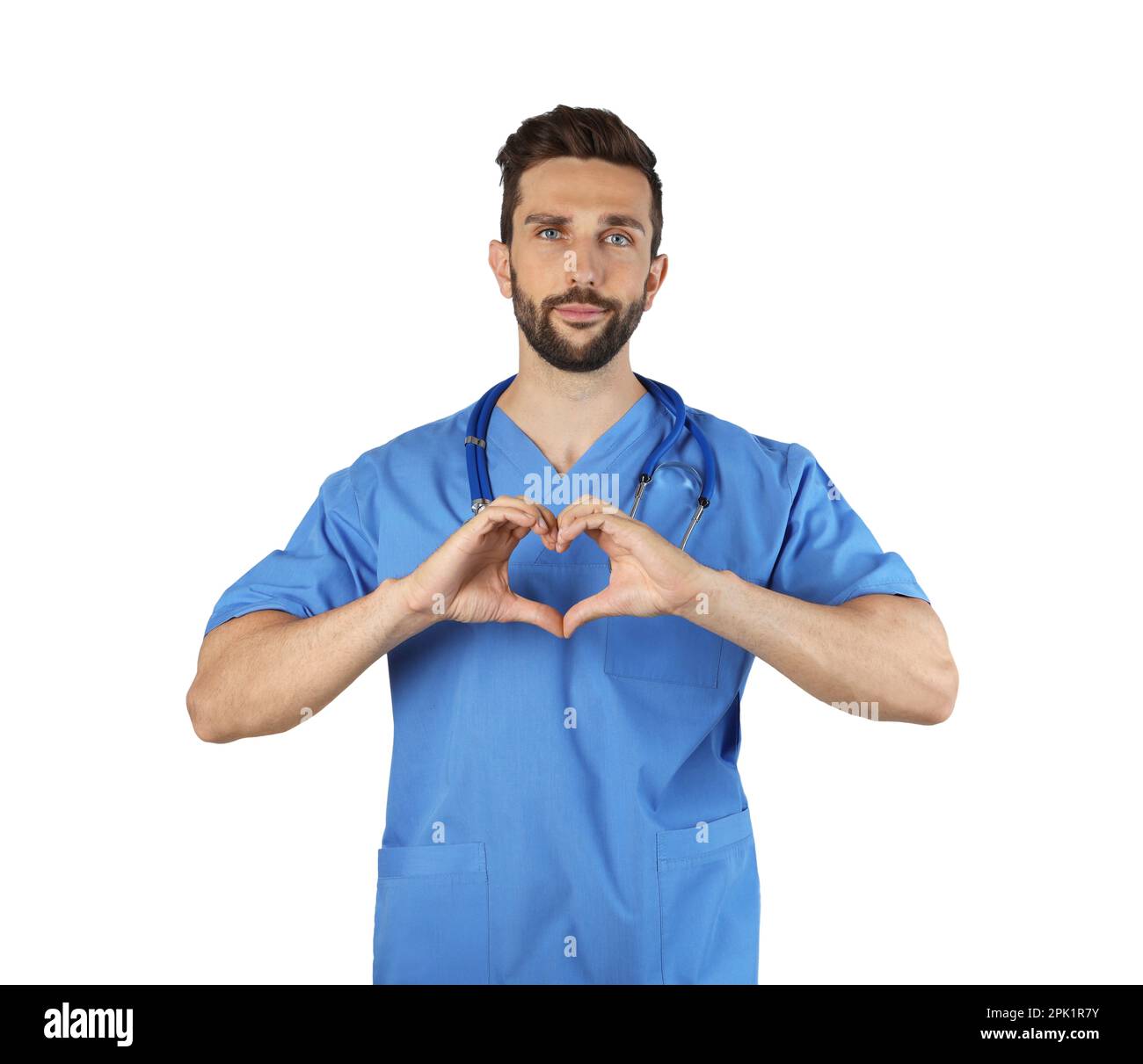 Doctor making heart with hands on white background Stock Photo - Alamy