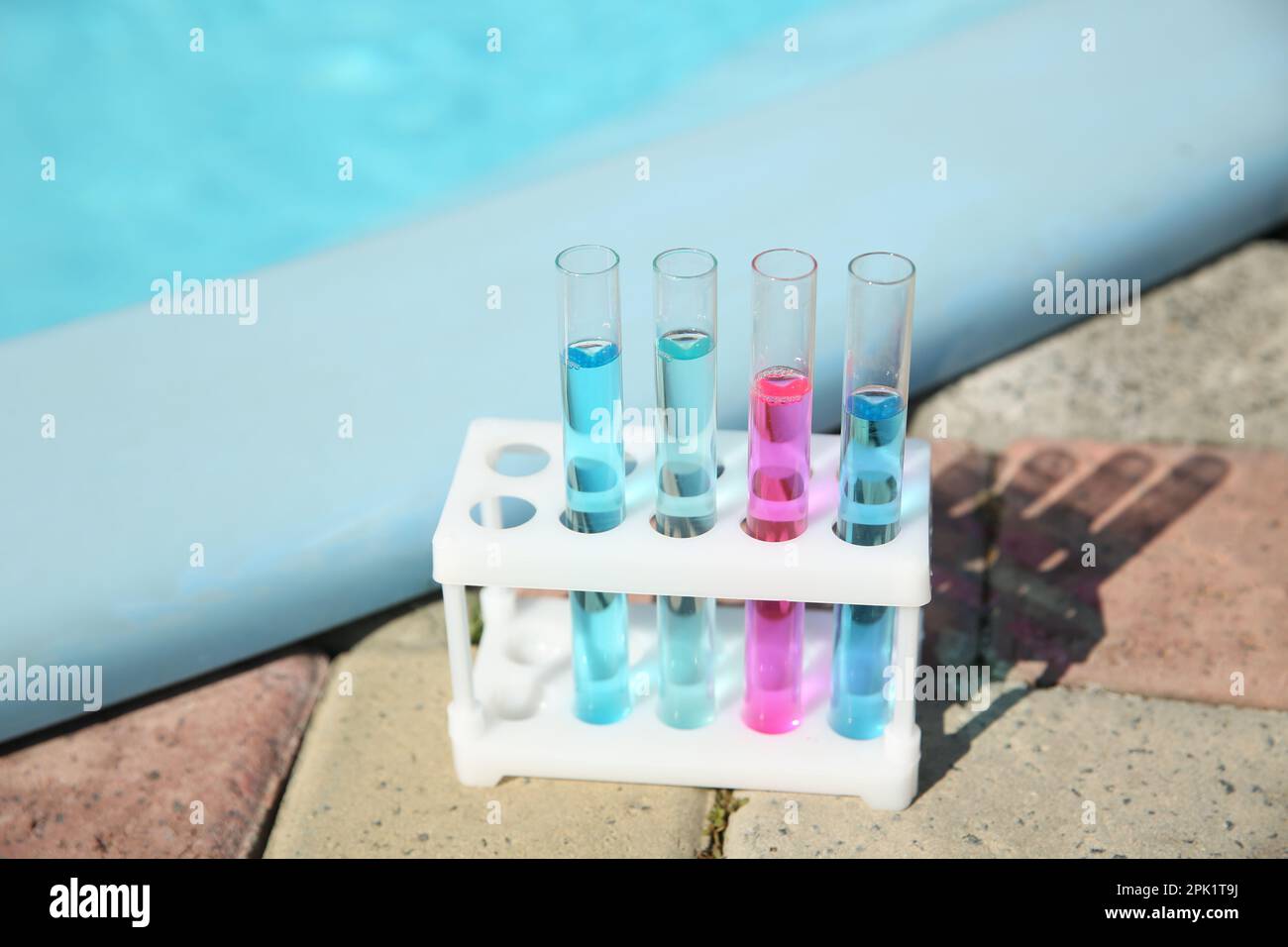 Test tubes with reagents in rack near swimming pool Stock Photo - Alamy