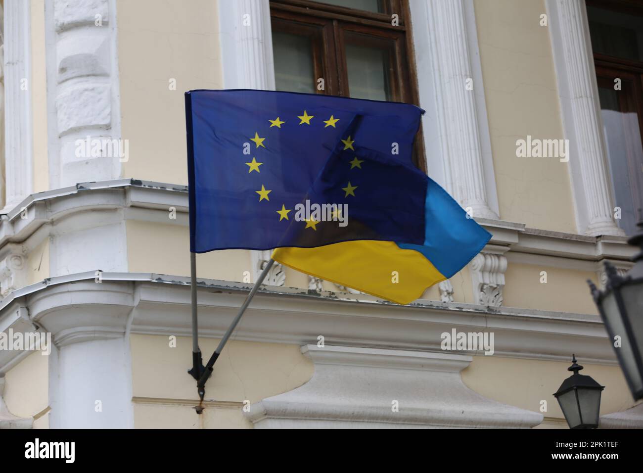 Flags of Ukraine and European Union on building facade Stock Photo - Alamy