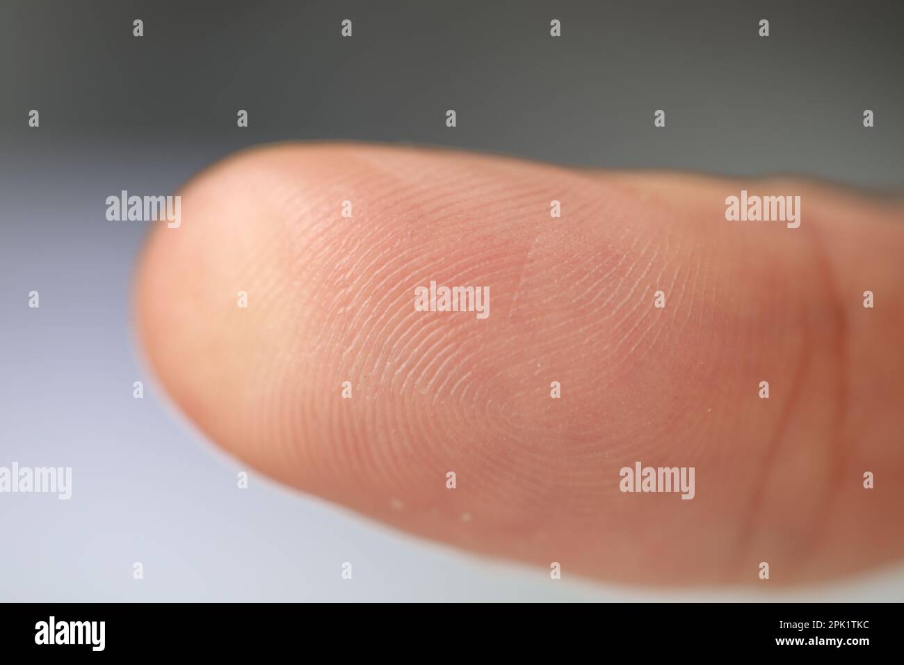 Closeup view of woman's finger on blurred background Stock Photo - Alamy