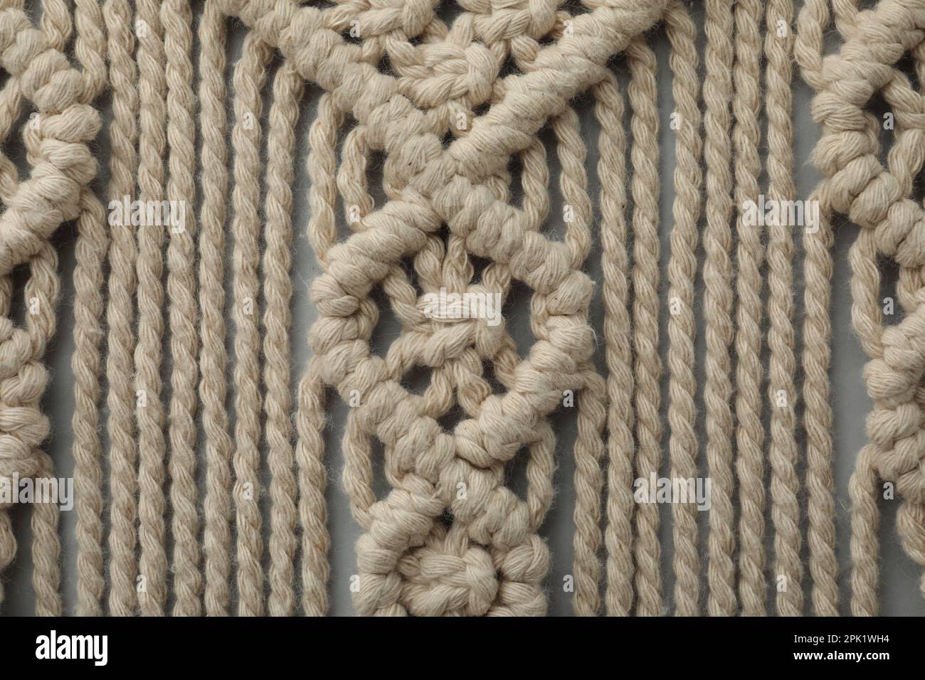 Texture of beautiful macrame as background, top view. Decorative ...